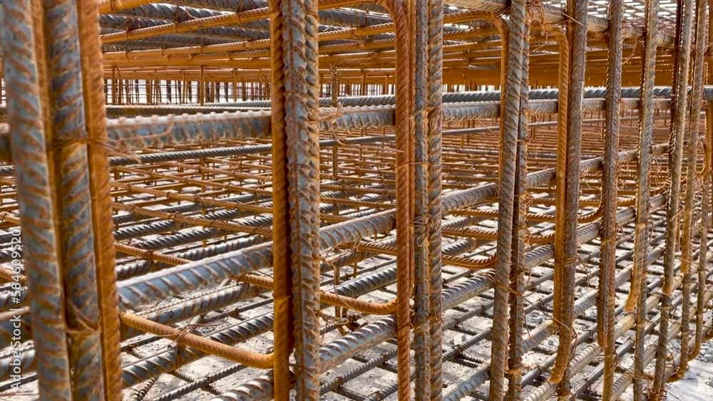 Sunlight into the lens. Industrial background. Rebar texture. Rusty ...