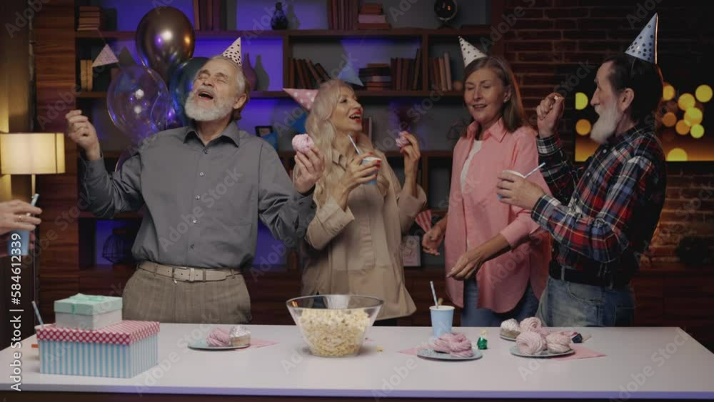 Mature people in the retirement home are overeating in the birthday ...