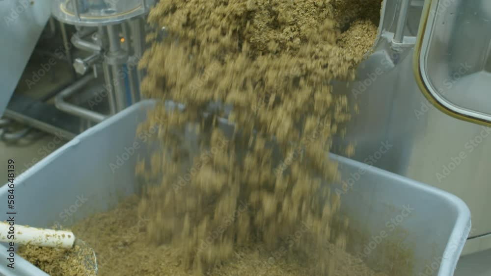 Wideo Stock: Close-up shot of blades turning, and hot steaming spent ...