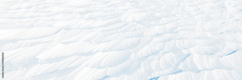 Snow texture. Wind sculpted patterns on snow surface. Wind in the ...
