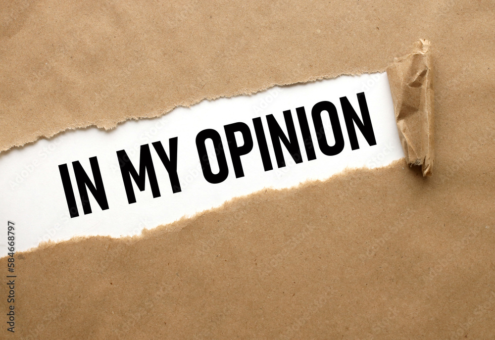 My opinion text on white sheet of paper on craft background, business ...