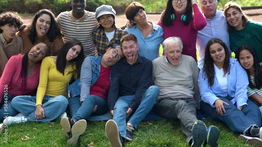 Group of multi generational people having fun together outdoor ...