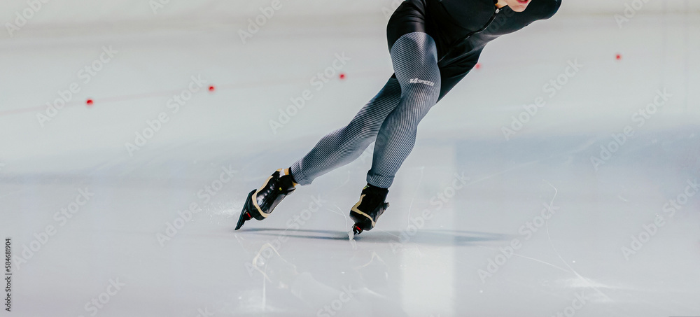 male speed skater athlete at speed skating competition, skin suit ...
