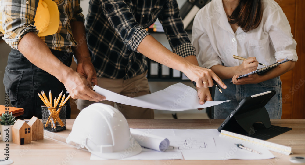 Engineer teams meeting working together wear worker helmets hardhat on ...