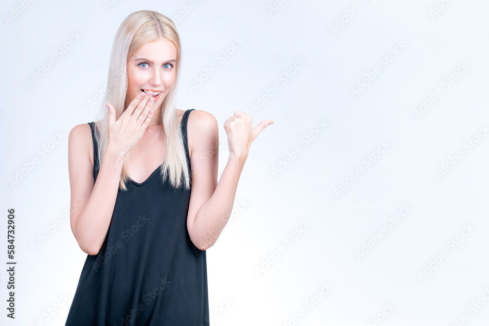 Personable beautiful woman with perfect makeup clean skin pointing ...
