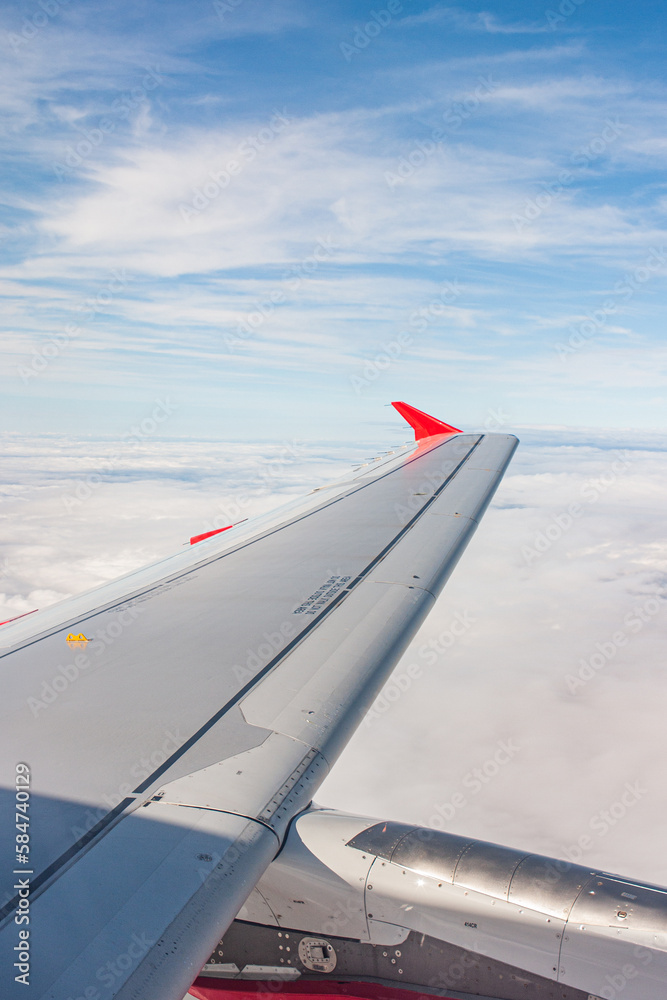 Wing view during flight Stock Photo | Adobe Stock