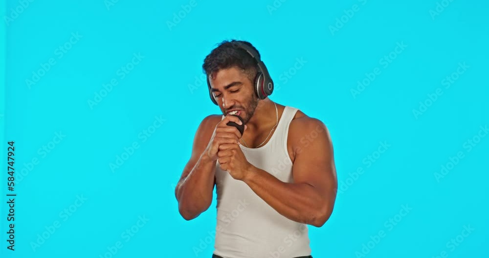 Singer, rapper or man with headphones and microphone in studio to sing ...