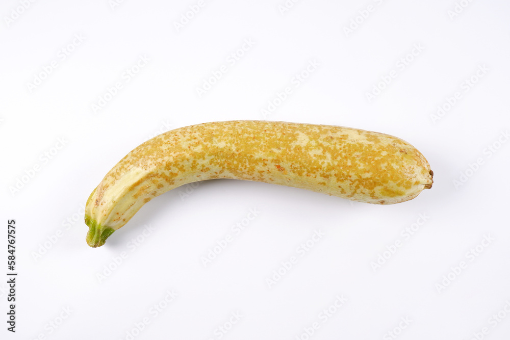 Spoiled zucchini with affected skin, highlighted on a white background ...