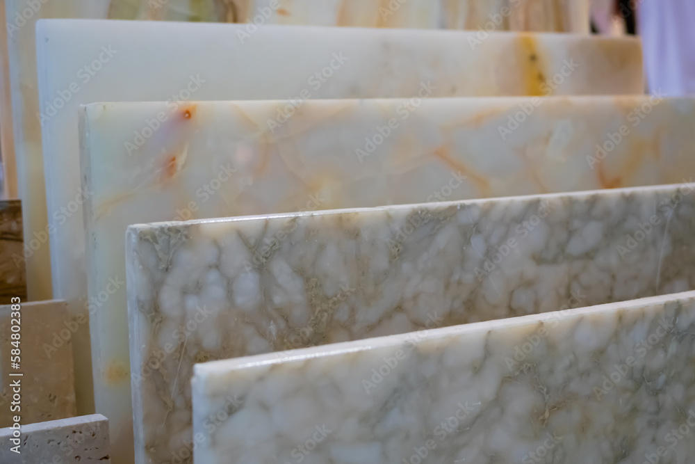 Colorful marble stone slabs on counter for sale at hardware store ...