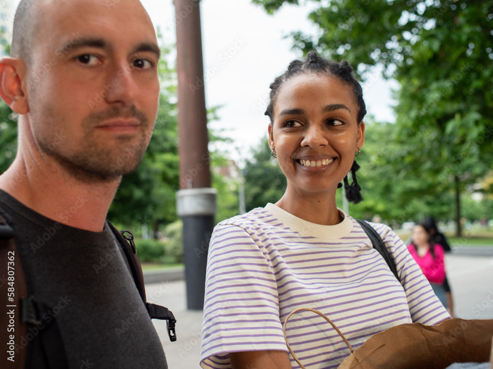 Smiling happy friends candid street portrait Stock Photo | Adobe Stock