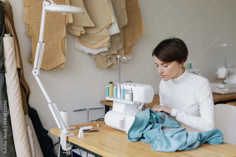 Textile machine. Garment manufacture. Modiste. Seam. Thread Stock Photo ...