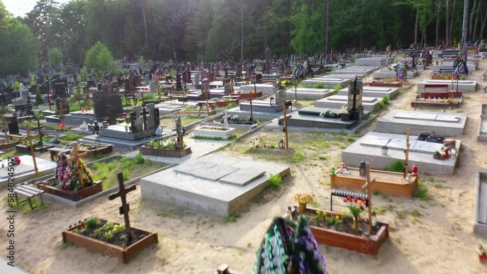 2022 - aerial of a civilian cemetery or graveyard with many graves near ...