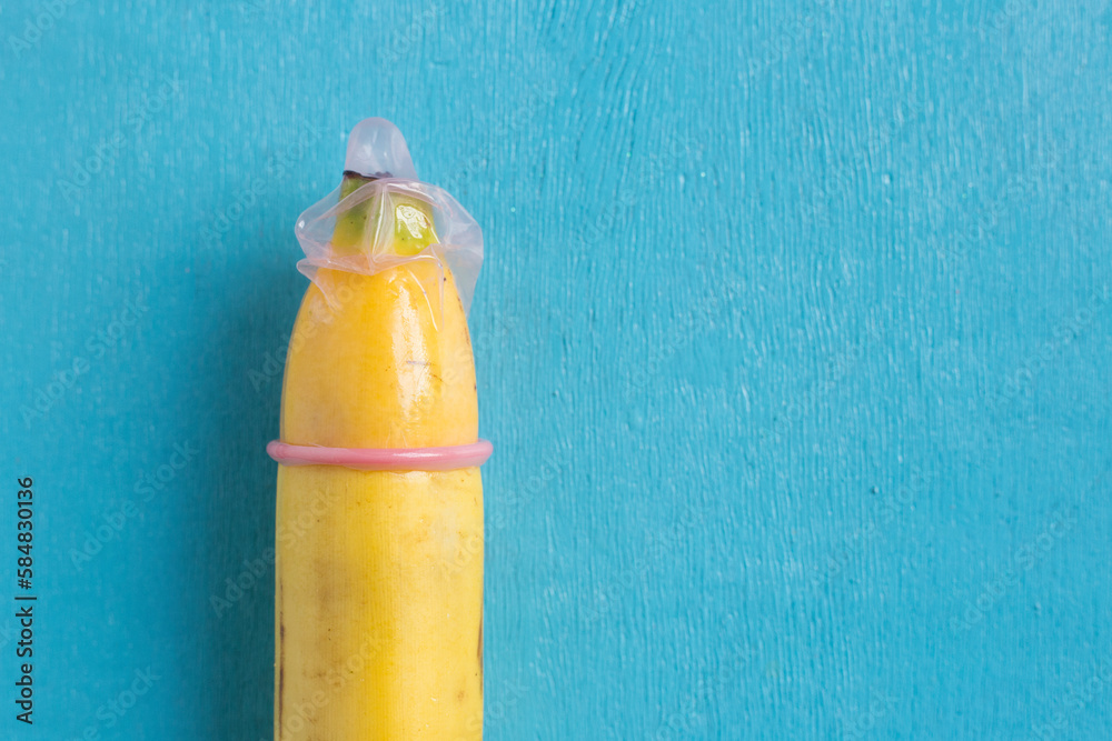 Sex education concept “Condom on banana” Stock Photo | Adobe Stock