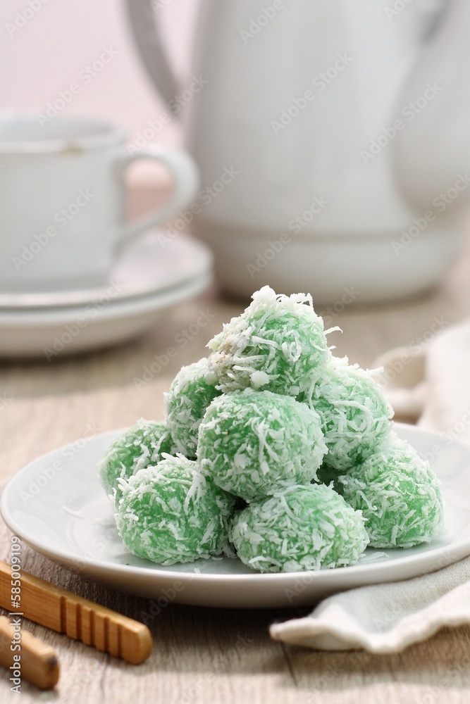 Klepon or kelepon, is a snack of sweet rice cake balls filled with ...