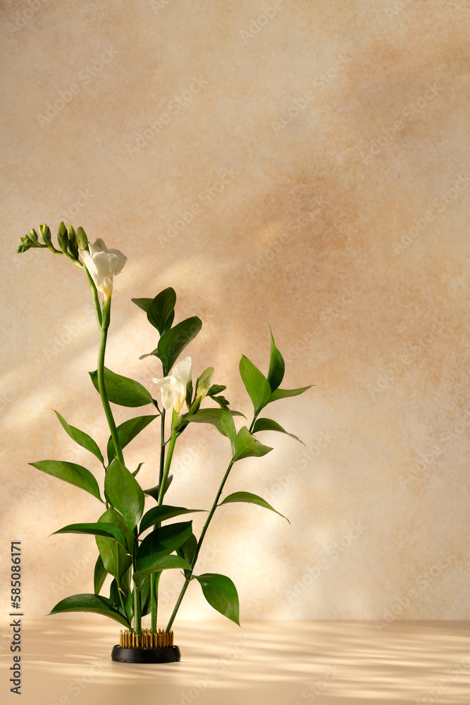 Composition of flowers on a kenzan. advertising for a flower business ...