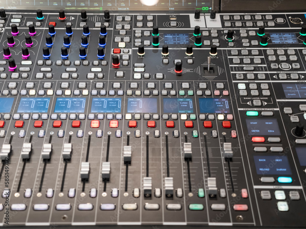 Sound audio mixer of sliders and buttons on a console with connected ...