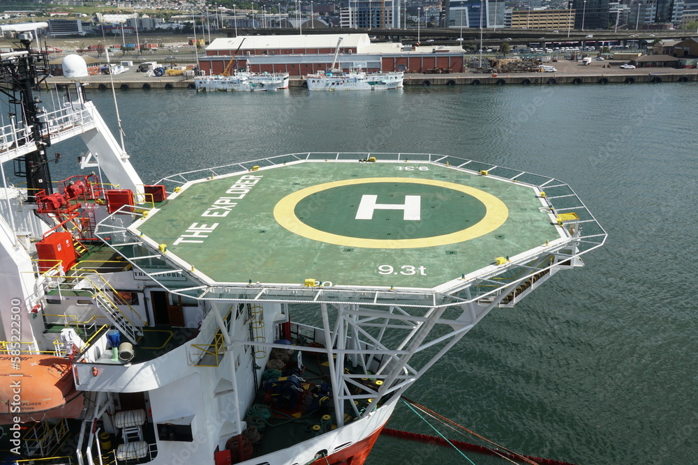 Offshore trenching support vessel with green helideck moored in Cape ...