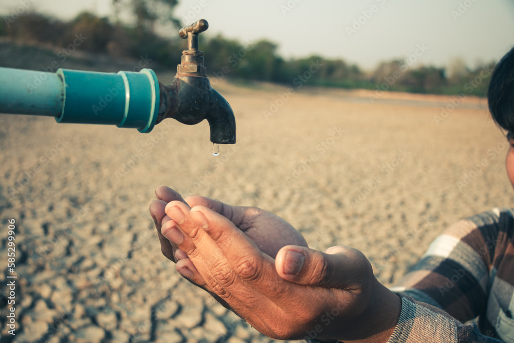 Hand for drinking water to live through drought, Concept drought and ...