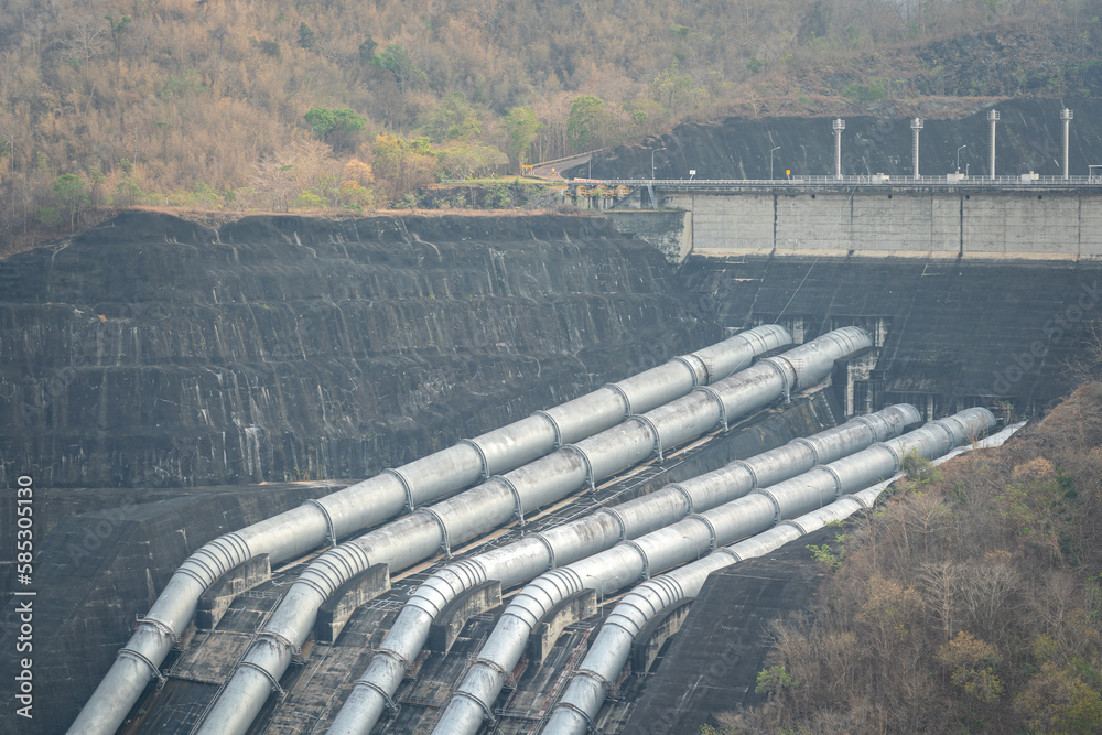 Huge metal pipeline structure on the electricity hydropower plant ...