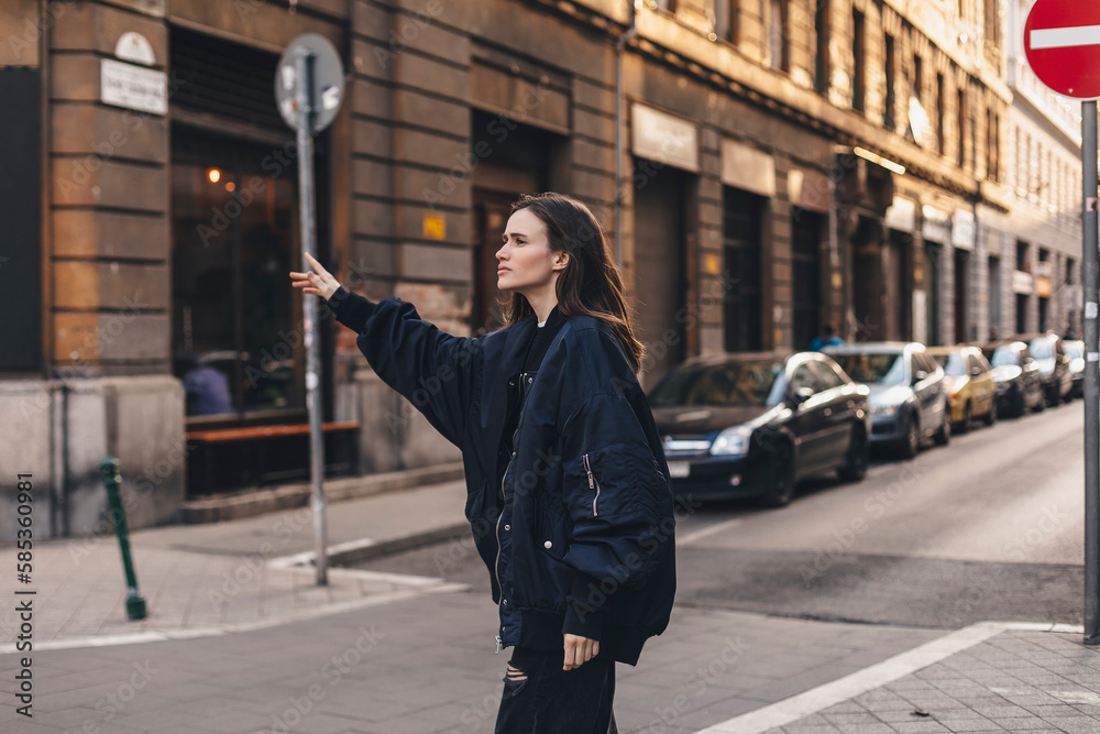 Alarmed woman try to catch taxi car. Depression woman look sad standing ...