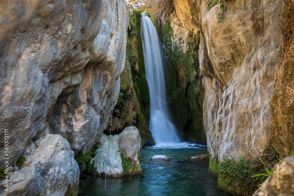 Scenic view of the main waterfall of Fuentes del Algar in Callosa d'En ...