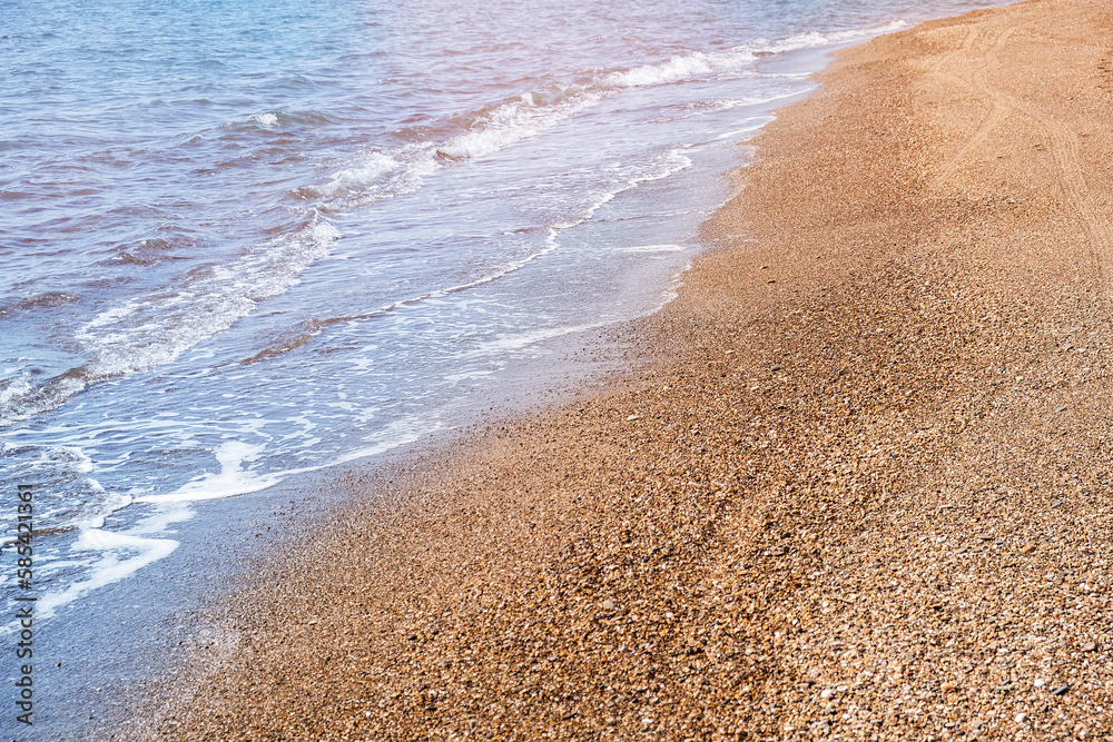 Soft blue ocean wave on clean sandy beach. Vacation or travel ...