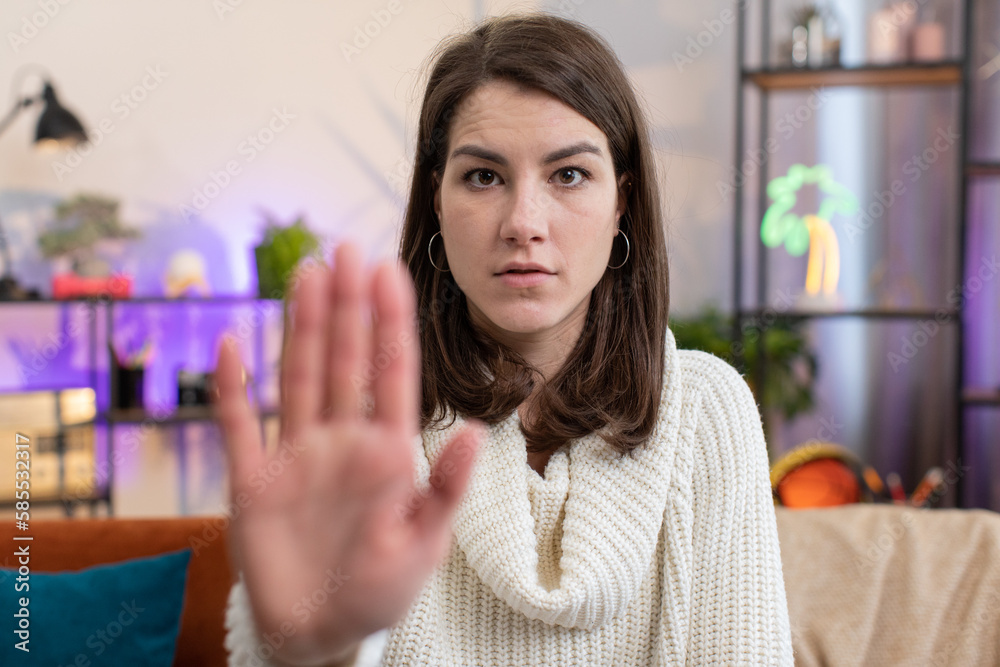 Stop gesture. Angry young woman say No hold palm folded crossed hands ...