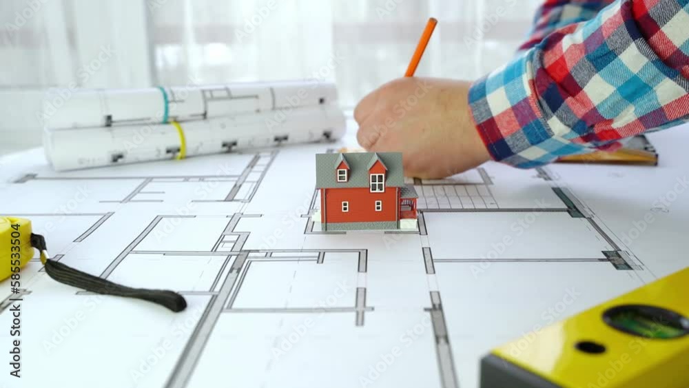 the architect is working on an architectural and construction project ...