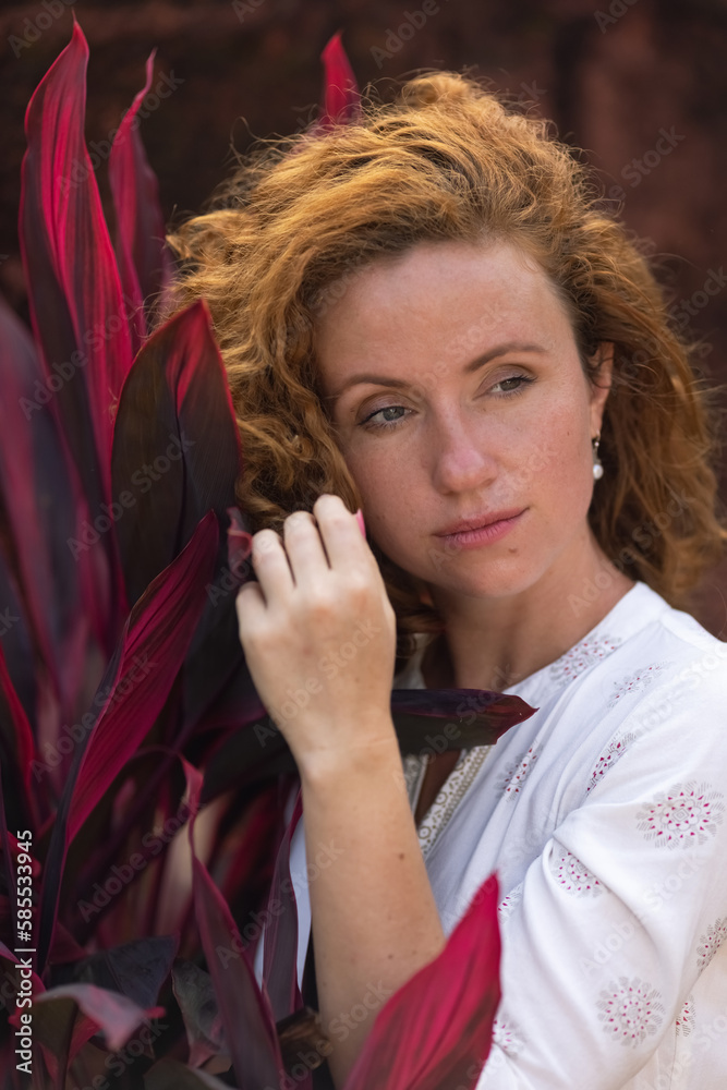 This portrait depicts a stunningly beautiful young woman with fiery red ...