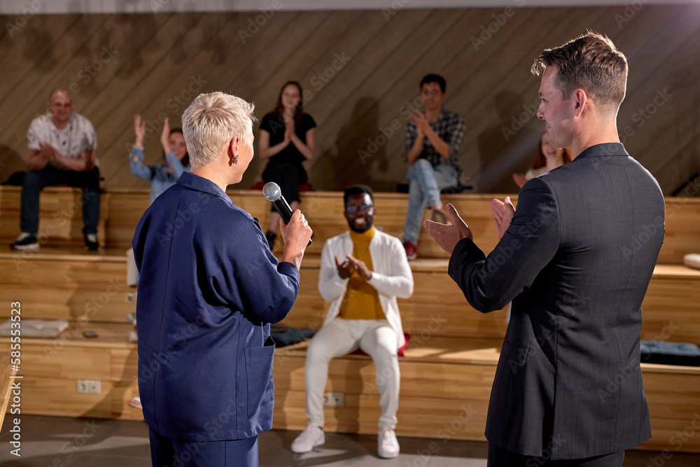 Couch Giving Talk at Business Meeting. Audience in conference hall ...