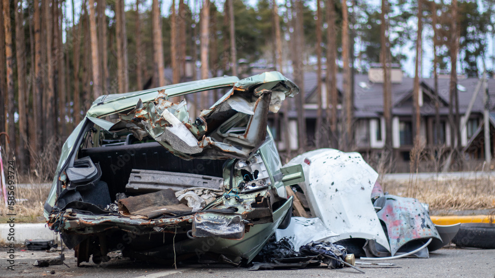 Broken crumpled car after a severe accident with a skewed body, after a ...