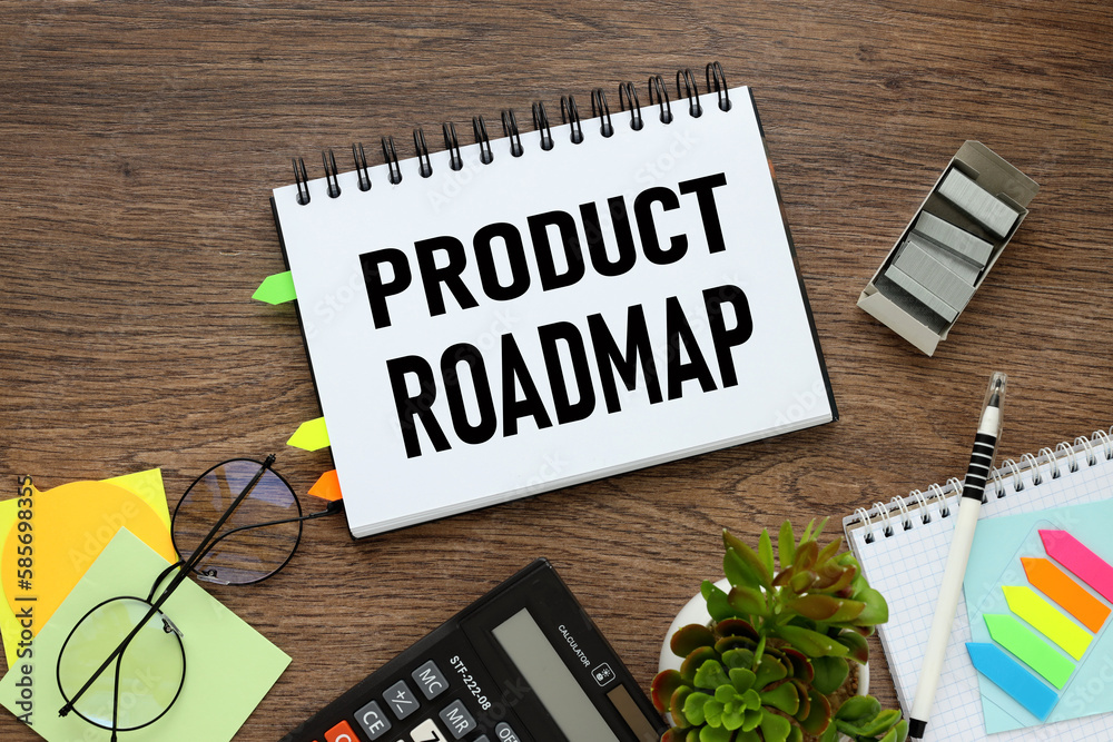 PRODUCT ROADMAP text on notepad pages with tacky bookmarks and stickers ...