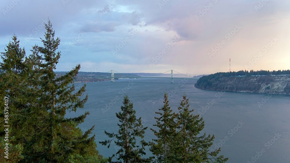Aerial view of the Tacoma Narrows Bridge over the Puget Sound at sunset ...