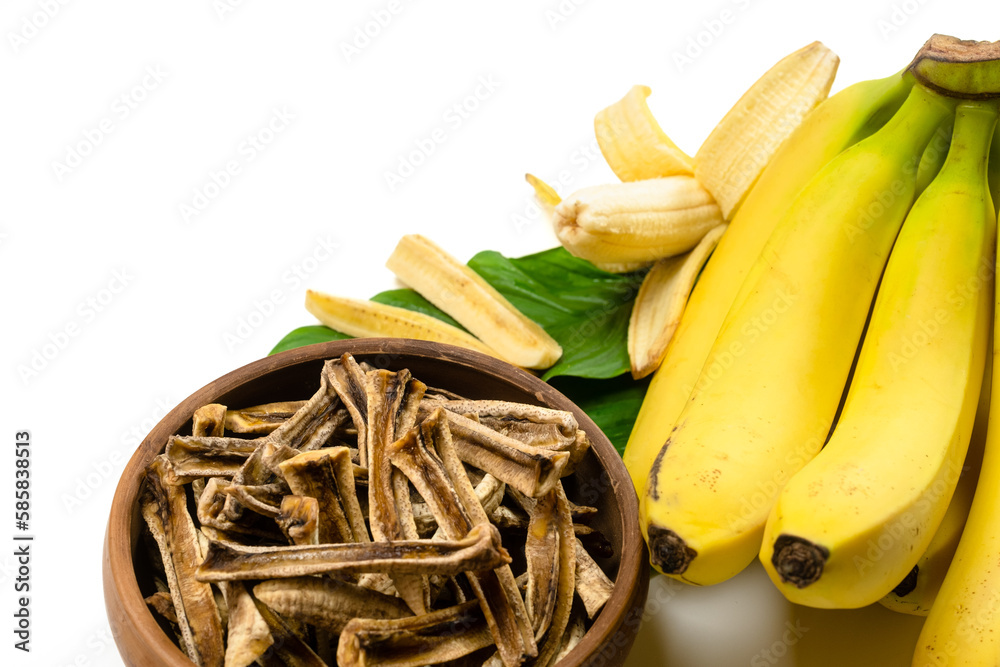 Dried bananas in the bowl and fresh bananas isolated on white ...