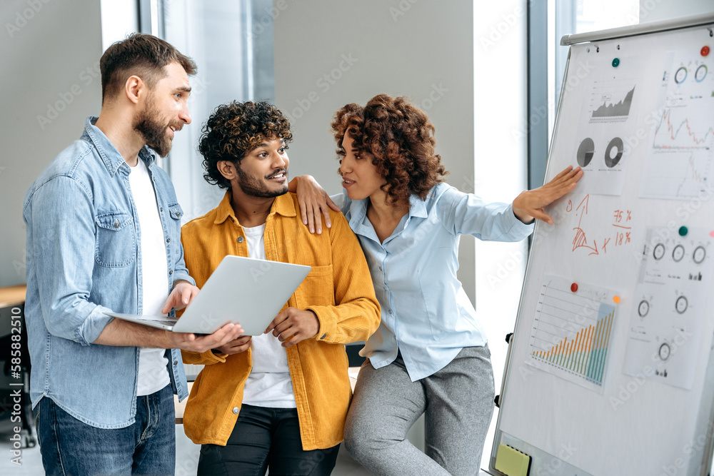 Cooperation concept. Motivated multiracial employees of a company ...