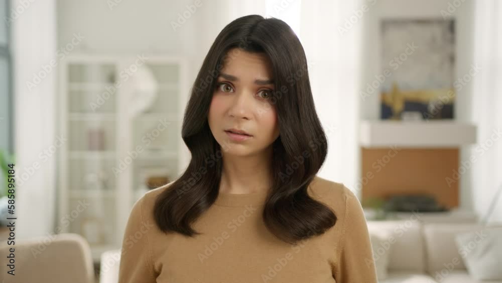 Young woman with questioning face. questioned face expressions ...