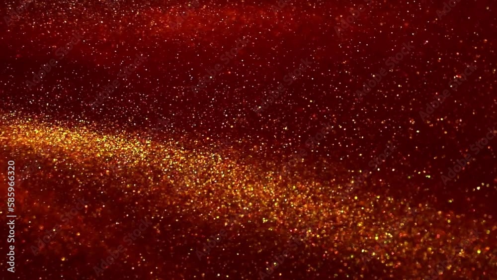 Golden Glitter Particles In Red Liquid. Magic strains of gold dust ...