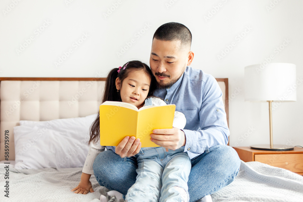 little asian girl learn to read at home with dad, korean man with ...