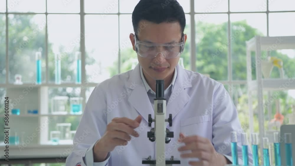 Research concept of 4k resolution. Asian scientists are examining the ...