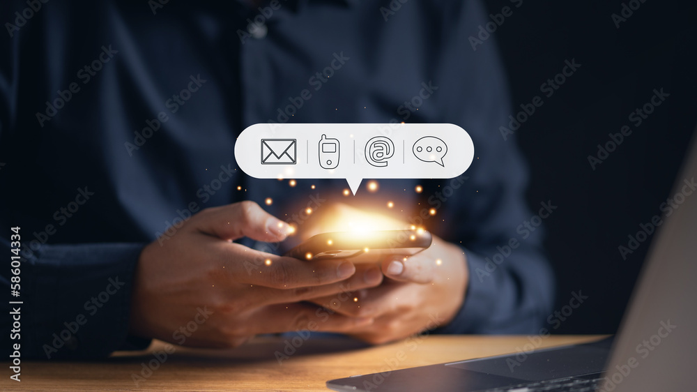 Man using his phone with an email icon, highlighting the importance of ...