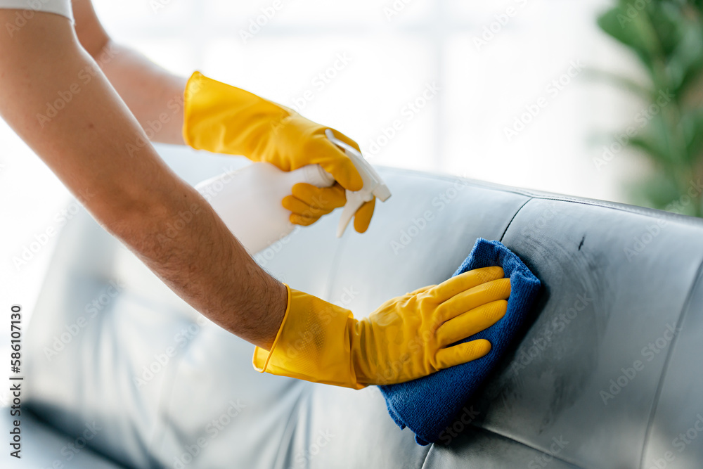 people doing cleaning are using cloths and spraying disinfectant Wipe ...