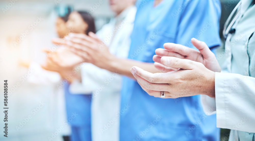 Clapping hands, celebration and team of doctors in the hospital with success in teamwork or ...