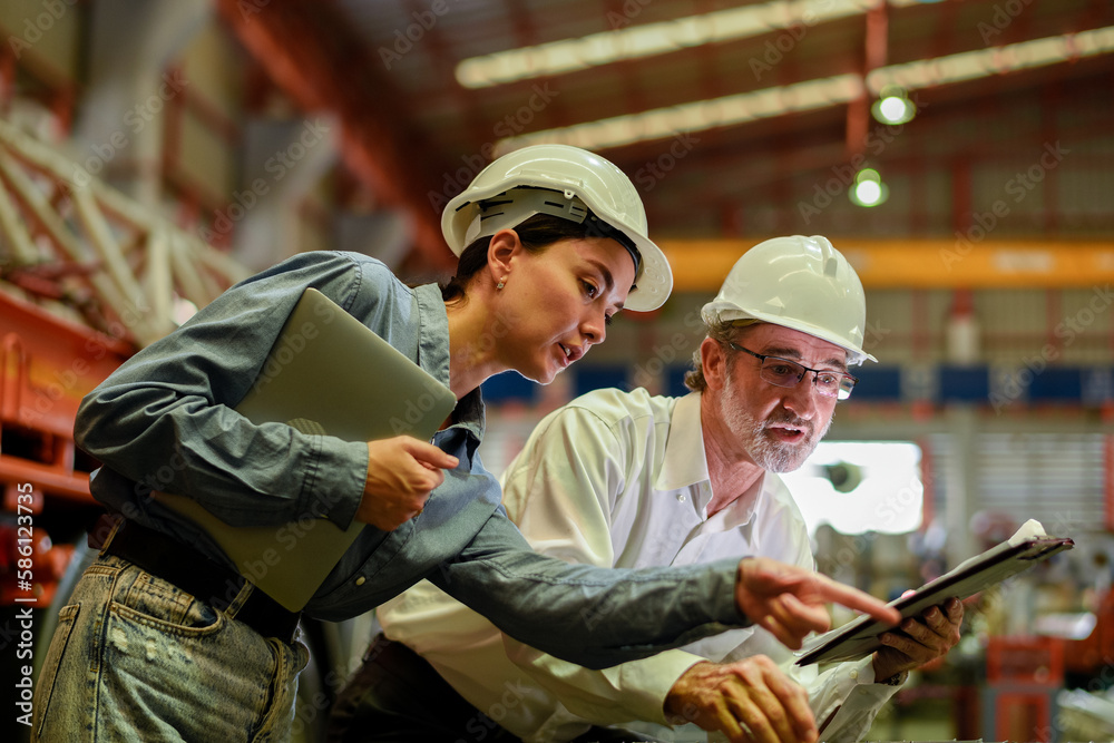 partner woman engineer assistant in helmet inspection check heavy ...