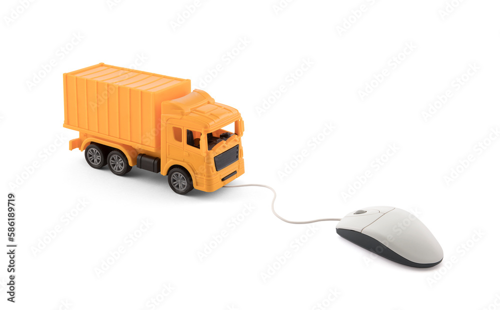 Yellow cargo delivery truck miniature connected to computer mouse on ...