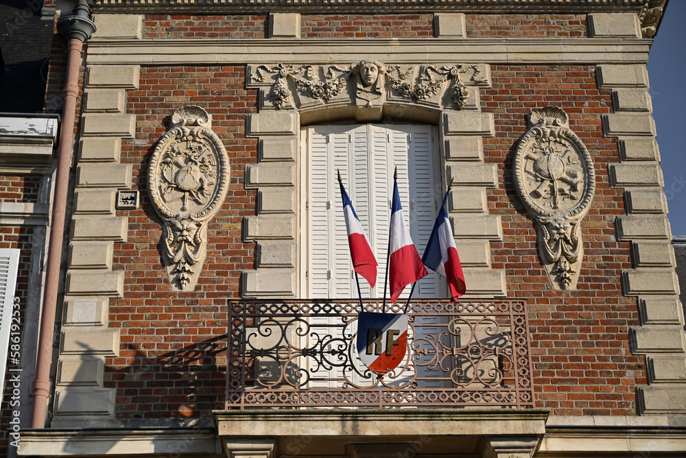 The French flag, fluttering in the wind, with its three vertical ...