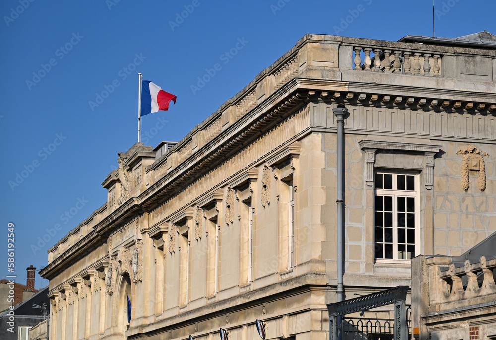 The French flag, fluttering in the wind, with its three vertical ...