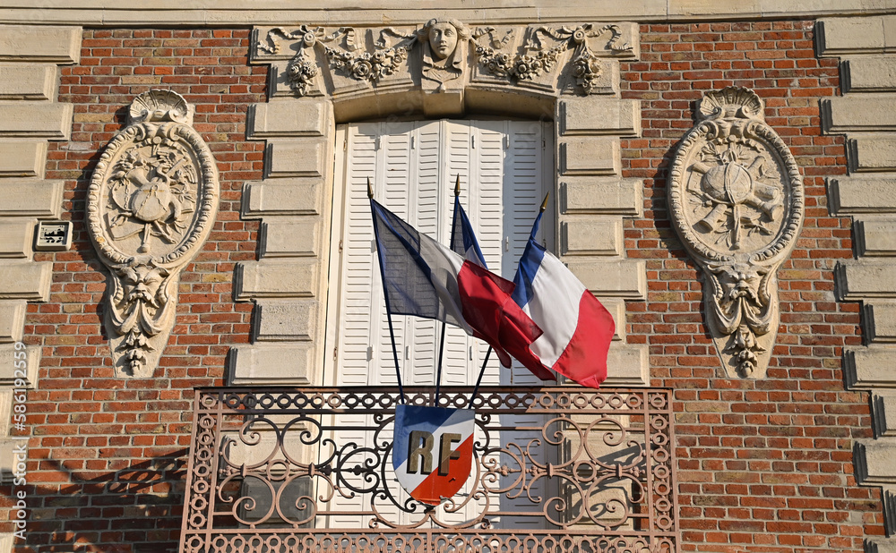 The French flag, billowing in the breeze, represents the unity, liberty ...