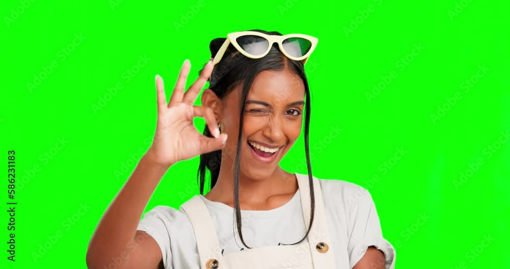 Ok hand, happy and face of Indian woman on green screen for agreement ...
