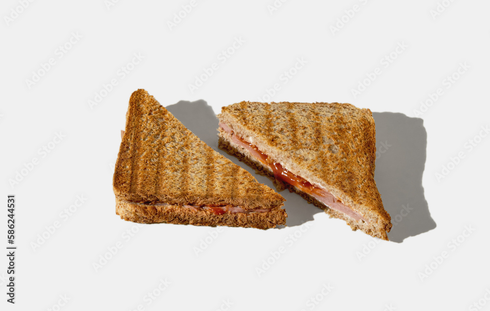 Toasted sandwich cut in half on white background. Minimal horizontal ...