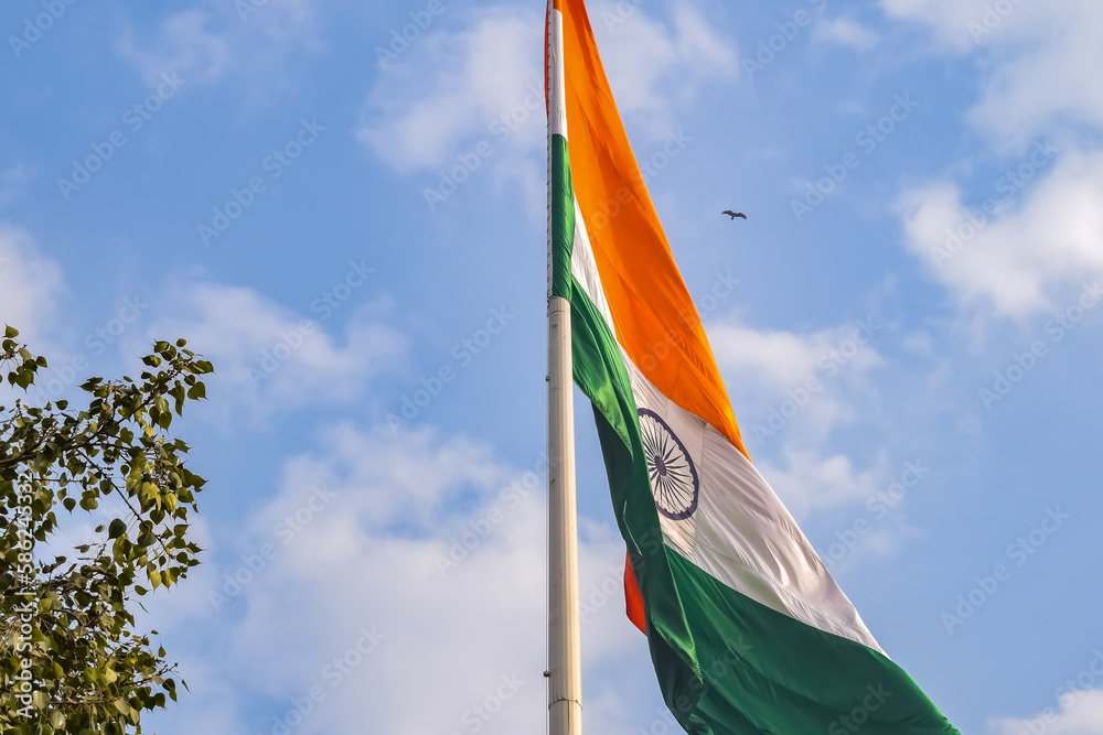 India flag flying high at Connaught Place with pride in blue sky, India ...